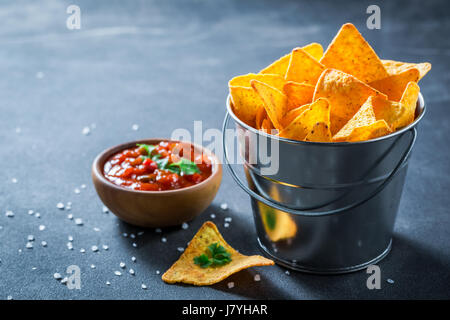 Mexican nachos with salt and spicy sauce. Mexican popular snack Stock ...