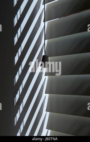 Light streaming through wooden Venetian blinds Stock Photo - Alamy