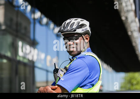 Young male police community support officer Stock Photo - Alamy