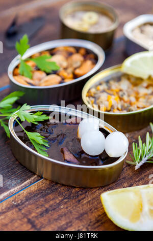 Assortment of open tin cans for a healthy dinner Stock Photo - Alamy