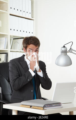 office desk cold catarrh sits work job labor sick ill workers laborer ...