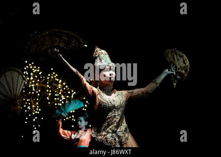 Filipino dancers performing traditional Philippine Carinosa folk dance ...