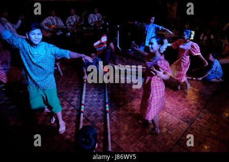 Tinikling folk dancing, Manila Stock Photo - Alamy