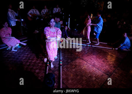 Tinikling folk dancing, Manila Stock Photo - Alamy