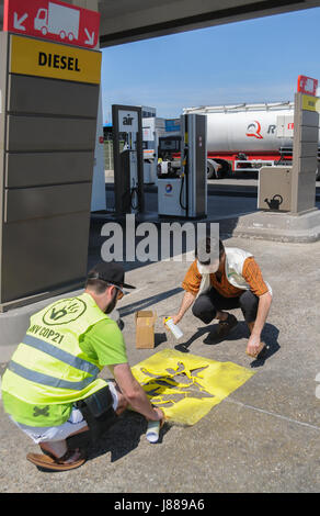 Greenpeace and ANV-COP 21 activists protest against Total's drilling ...