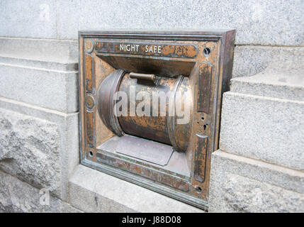 Night safe deposit box on outside wall at a Lloyds country bank Stock ...