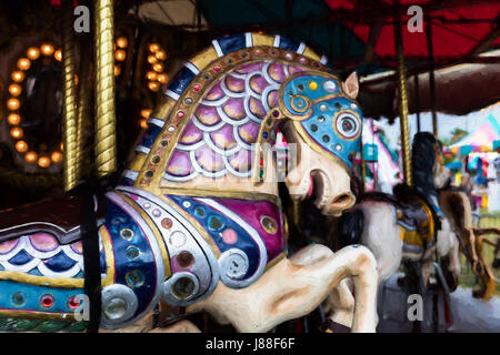 Merry go round animals at the county fair Stock Photo - Alamy