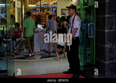 A security guard in the Philippines Stock Photo - Alamy
