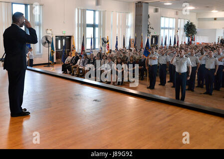 Col. Thomas Hensley gives his final salute as the commander of the 70th ...