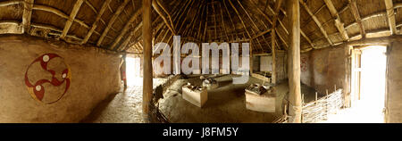 Celtic Iron Age roundhouse reconstructed on original foundations at ...