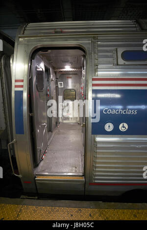 open door of amtrak coach class carriage penn station New York City USA ...