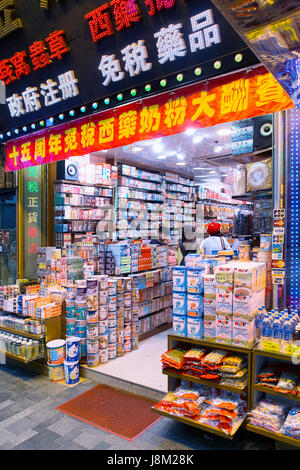 Drugstore shop in Hong Kong. Full shelves with products, boxes ...