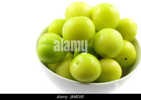 Fresh Can Erik plums in a bowl on white background Stock Photo ...