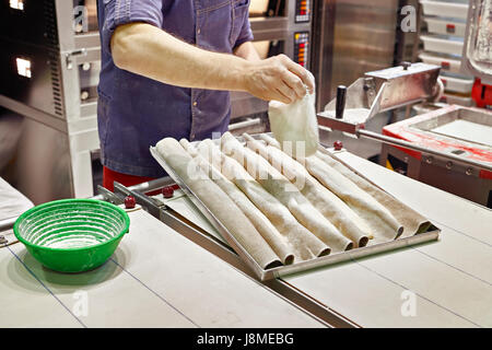 bread preparation. loaves of dough before baking Stock Photo - Alamy