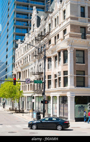 Road signs at intersection, corner of Spring Street and Broome Street ...