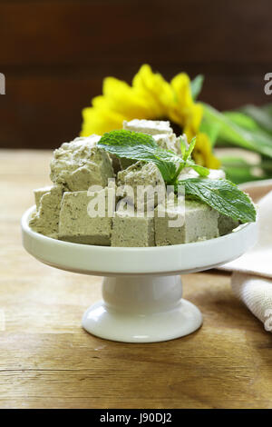 Oriental sweets halva from sunflower seeds with honey Stock Photo - Alamy