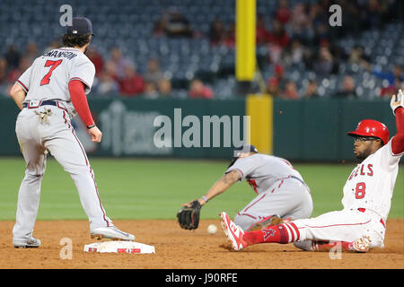 Atlanta Braves' Dansby Swanson (7) slides into third base during the ...