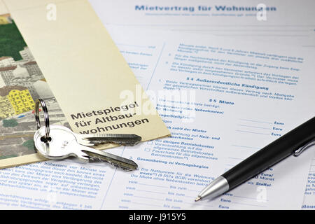 German lease contract with rent index on desktop Stock Photo - Alamy