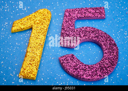 Number fifteen purple color over a red background. Anniversary ...