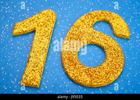Number sixteen yellow color over a red background. Anniversary ...