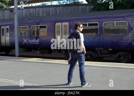 Finnieston railway station platform Scotrail train scene passengers ...