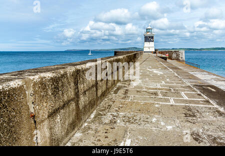 View of the lighthouse at the end of Holyhead breakwater on Anglesey ...
