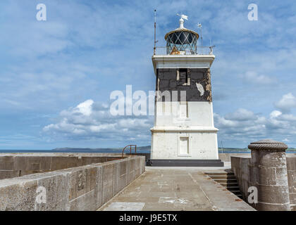 View of the lighthouse at the end of Holyhead breakwater on Anglesey ...