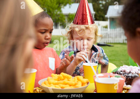 Children Enjoying Outdoor Birthday Party Together Stock Photo - Alamy