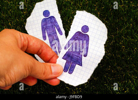 Hand holding a sheet of paper on a white background Stock Photo - Alamy