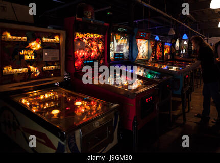 Row of pinball machines in arcade Stock Photo - Alamy