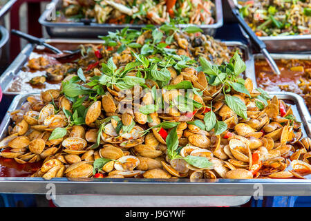a stack of raw mussels on a plate. Typical Galician and Spanish food ...