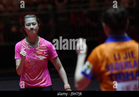 Ding Ning of China celebrates after scoring against Adriana Diaz of ...