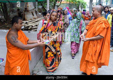 Dhaka, Bangladesh. 02nd June, 2017. Bangladeshi Buddhist monks give ...