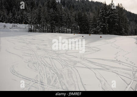 tracks on ski slopes at beautiful sunny winter day Stock Photo - Alamy