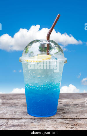 blue lemon soda on wooden table with abstract bokeh background Stock ...