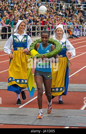 Stockholm. 3rd June, 2017. Konjit Tilahun (C) of Ethiopia celebrates ...