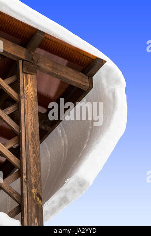 Snow slides off the roof gazebo Stock Photo - Alamy