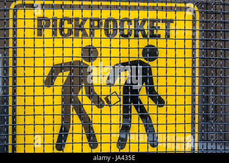 Pickpocket gallery - a warning sign black on yellow background Stock ...