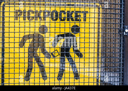 Pickpocket gallery - a warning sign black on yellow background Stock ...