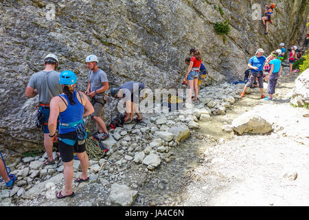 Rock climbers queueing to climb at Orpierre, France Stock Photo - Alamy