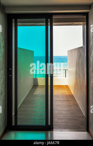 Exit to the balcony overlooking the sea Stock Photo - Alamy