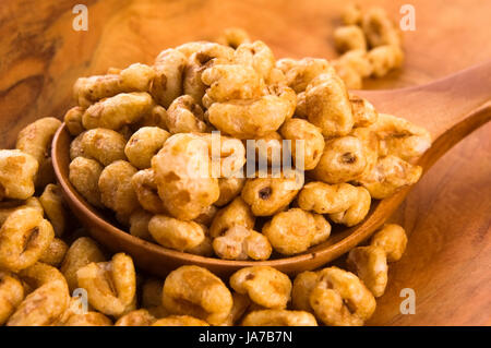 Popped wheat grains Stock Photo - Alamy
