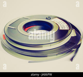 Vintage magnetic tape reel for computer data storage isolated on white ...
