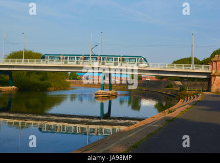 Tram crossing Wilford Toll Bridge over the river Trent, Nottingham ...