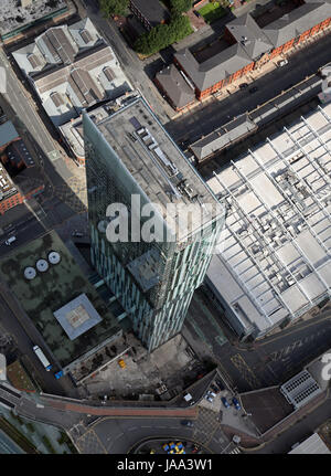 Modern skyscraper apartment tower block housing development with red ...