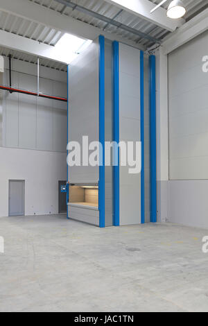 Vertical Carousel Storage Unit in Distribution Warehouse Stock Photo ...
