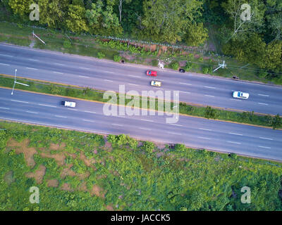 overhead view of car moving by road next to sea shore copy space Stock ...