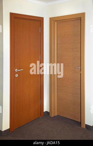Two wooden interior doors next to each other Stock Photo - Alamy
