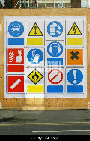 Safety first symbols, work safety, caution work hazards, danger ...