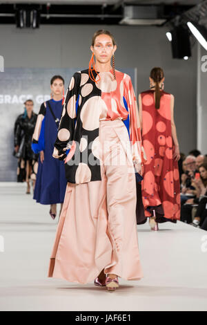 A model walks the runway during the Ravensbourne fashion show at ...